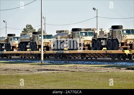 Military vehicles and equipment with the 389th Engineer Battalion is ...