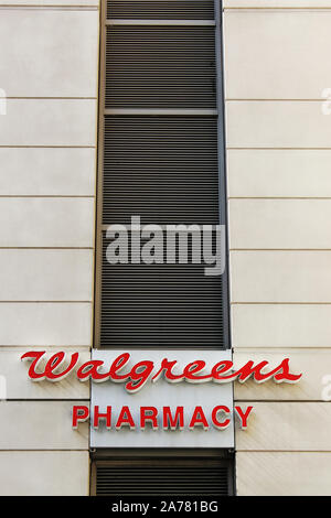 Walgreens Pharmacy drug store sign on the side of a building in ...