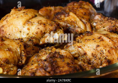 portions of chicken, baked in the oven Stock Photo - Alamy
