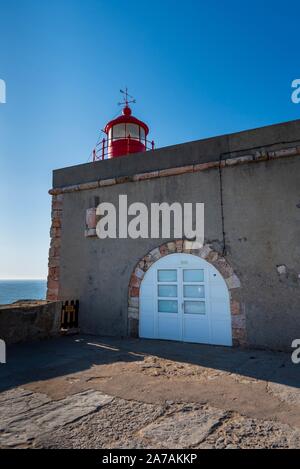 A view of the red lighthouse in Nazare, Portugal, on March 28, 2022 ...