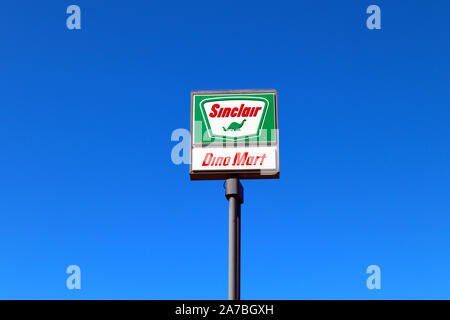 Dino Mart gas station with the Sinclair Oil Corporation dinosaur symbol ...