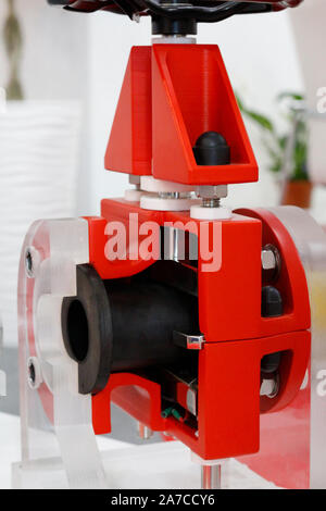 Manual shut-off valve shown in the photo in section. You see a cross ...