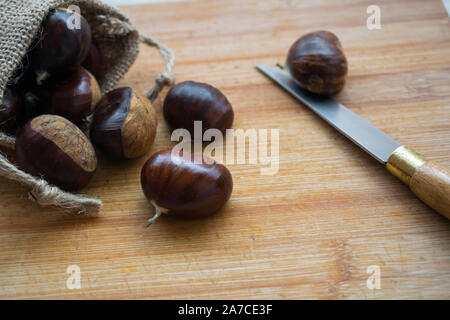 chestnuts inside a small sack Stock Photo - Alamy