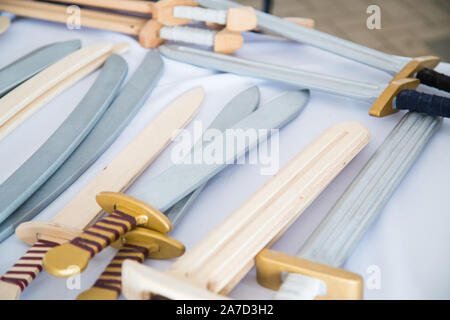Handmade wooden toy swords Stock Photo - Alamy