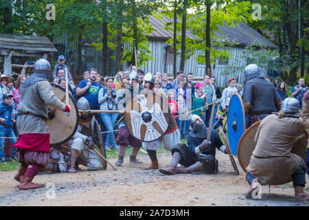 Militant medieval warriors fighting at historical festival Stock Photo ...