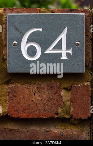Digits carved on wall, close-up Stock Photo - Alamy