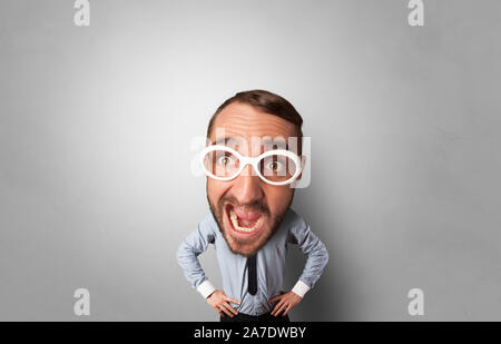 Big head on small body dreaming about being strong Stock Photo - Alamy