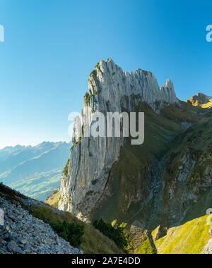 The Saxer Gap in the Swiss Alps is lit up by the sun on a morning Stock ...