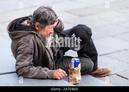 Alcoholic homeless man in downtown Manhattan New York City Stock Photo ...