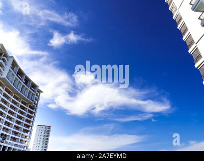 High-rise building and bright blue sky Stock Photo - Alamy