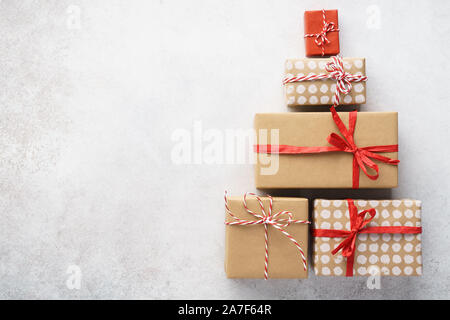 Christmas-tree made of gift boxes heap Stock Photo - Alamy