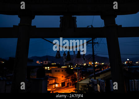 Japan in evening with illuminated hanging lantern lamp light on wooden ...