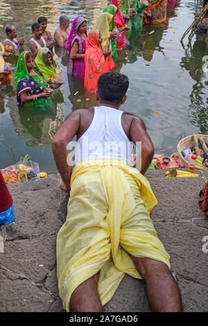 A Hindu man crawls on his belly to perform Dandwat Pranaam during the ...