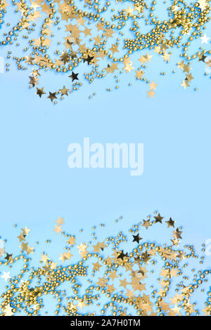 Christmas flat lay frame with golden, gray and black glass balls with ...