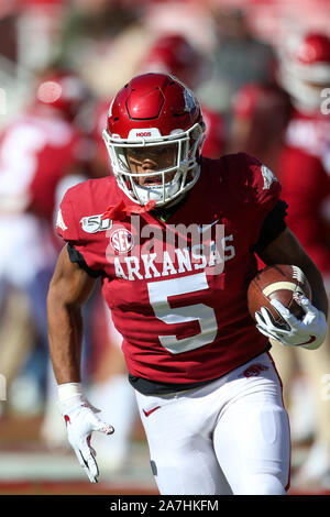 Arkansas running back Rakeem Boyd is tackled by LSU defender Devin ...