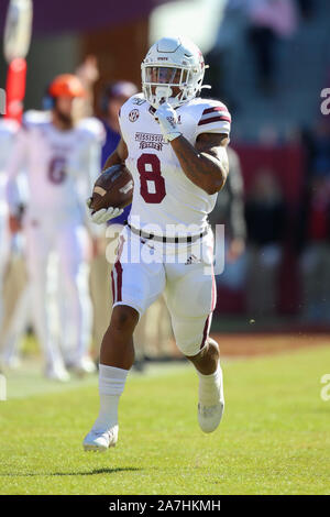 Mississippi State running back Kylin Hill (8) runs past Kentucky wide ...