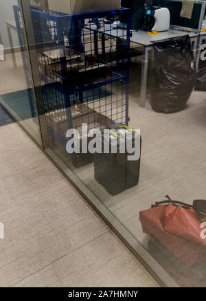 Metal blue cage that is used for storage and trasnportation of boxes ...