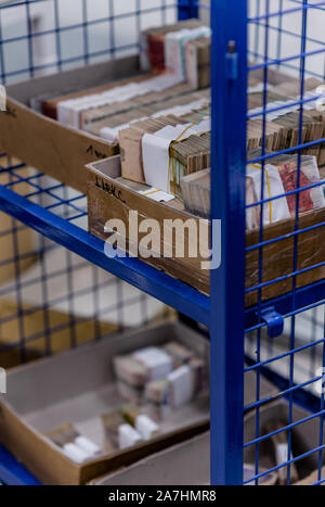 Metal blue cage that is used for storage and trasnportation of boxes ...
