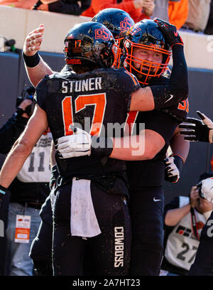 Oklahoma State wide receiver Christian Fitzpatrick (16) catches a pass ...
