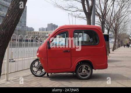 A small chinese 3 wheel car Stock Photo - Alamy