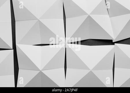 White paper folded in geometric shapes, abstract background Stock Photo ...
