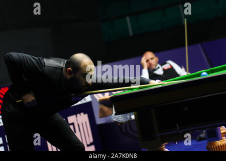 Hossein Vafaei (Iran) plays a shot during Round 1 of the Halo World ...