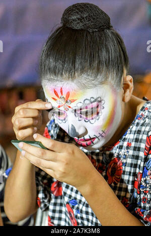 Merida woman with face painted during Hanal Pixan which is the ...