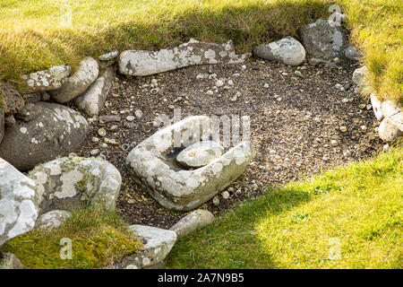 A trough quern and rubbing stone, used for grinding corn in the ...