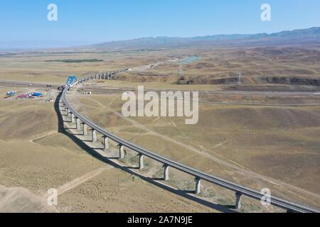 A train runs on the section between Kuytun and Tacheng Prefecture of ...