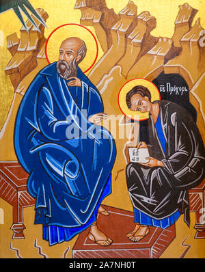 Icon of Saint John the Evangelist and Saint Prochorus the Deacon. The ...