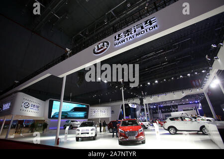 --FILE--People visit the stand of Hawtai Motor during the 16th Shanghai ...