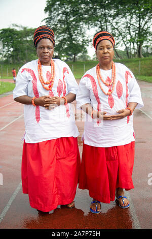 Traditional women in Benin Kingdom view artworks during an exhibition ...