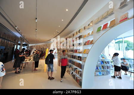 Citizens either stroll for the or read books in Duoyun Bookstore, which ...
