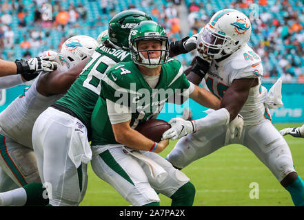 Miami Dolphins linebacker Sam Eguavoen (49) runs on the field during ...