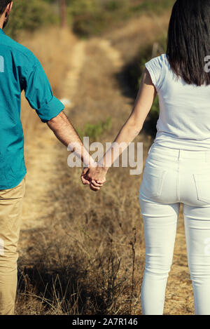 Young middle east woman holding makeup brush and blush making fish face ...