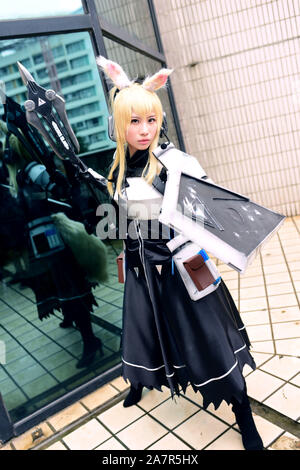 Cosplayers dressing up as characters of popular games and comics steal ...