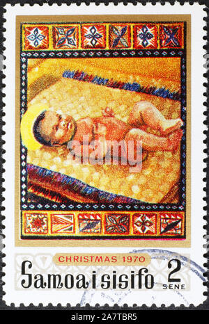 Samoan Jesus baby on postage stamp Stock Photo - Alamy