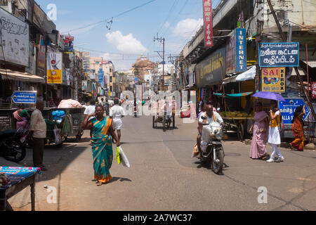 View of street with Tiruchirappalli Rock Fort in background, Trichy ...