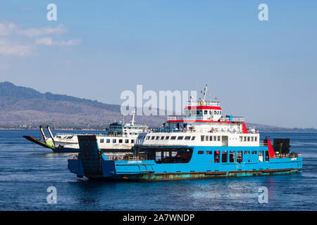 Ferries in the Bali Strait between the ports of Ketapang in Java and ...