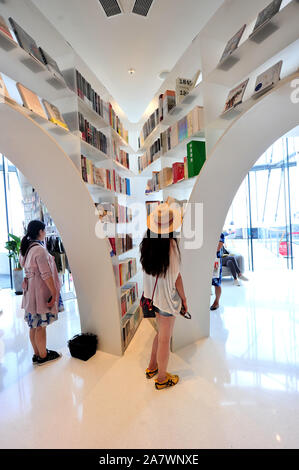Citizens either stroll for the or read books in Duoyun Bookstore, which ...