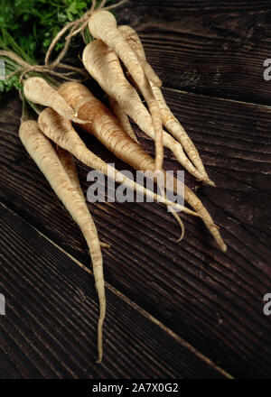 close up of parsley roots bunch on white background Stock Photo - Alamy