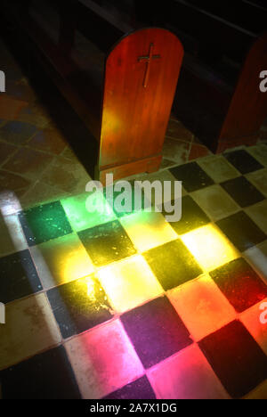 Coloured light reflected from stain glass windows, Baclayon Church ...