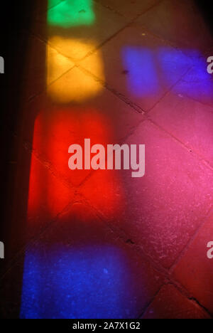 Coloured light reflected from stain glass windows, Baclayon Church ...