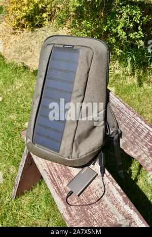 Sunnybag Iconic Solar Backpack, in sun, recharging battery, cell phones ...