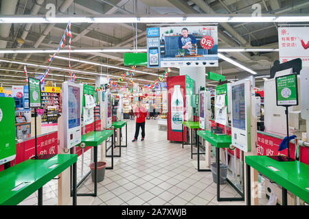 Checkout at the supermarket of a Carrefour Hypermarket Stock Photo - Alamy