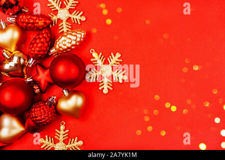 Beautiful christmas red deco baubles with gifts on golden glitter ...