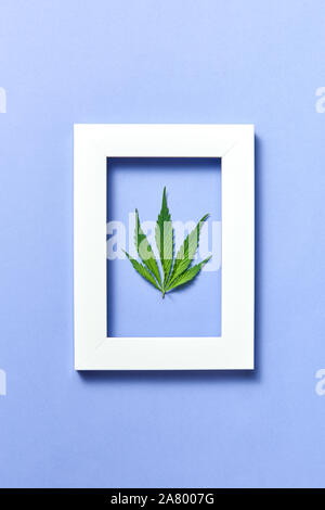 Handmade decorative rectangular frame with green fresh marijuana leaf ...