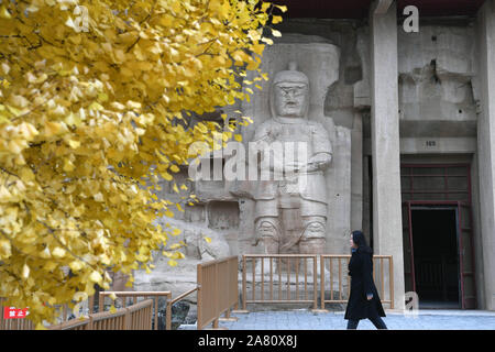 191105 -- QINGYANG, Nov. 5, 2019 -- A stone statue is pictured at the ...