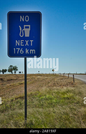 Information sign at the outback, next fuel station 315 km, Australia ...