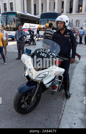 A Cuban police motorcyclist of the Policia Nacional Revolucionara ...